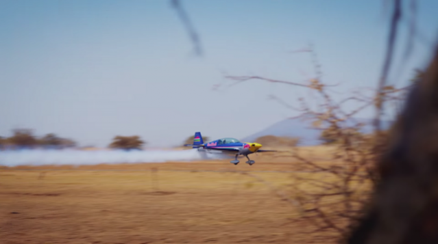 Dirtbike Backflips over Aerobatic Plane – Fubiz Media
