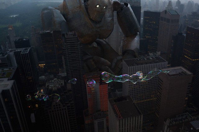 Gigantic Rusty Robot Walking in Megalopolis – Fubiz Media