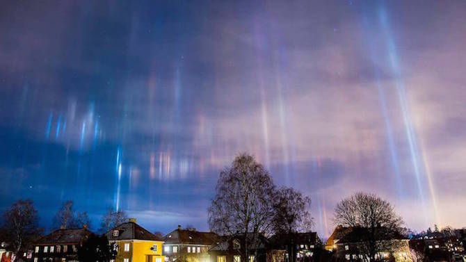 Cold Weather Phenomenon Displaying Beautiful Light Pillars in the Sky ...