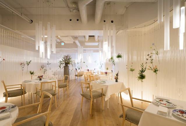 Amazing Restaurant Featuring Walls of Flowers & Transparent Tubes ...