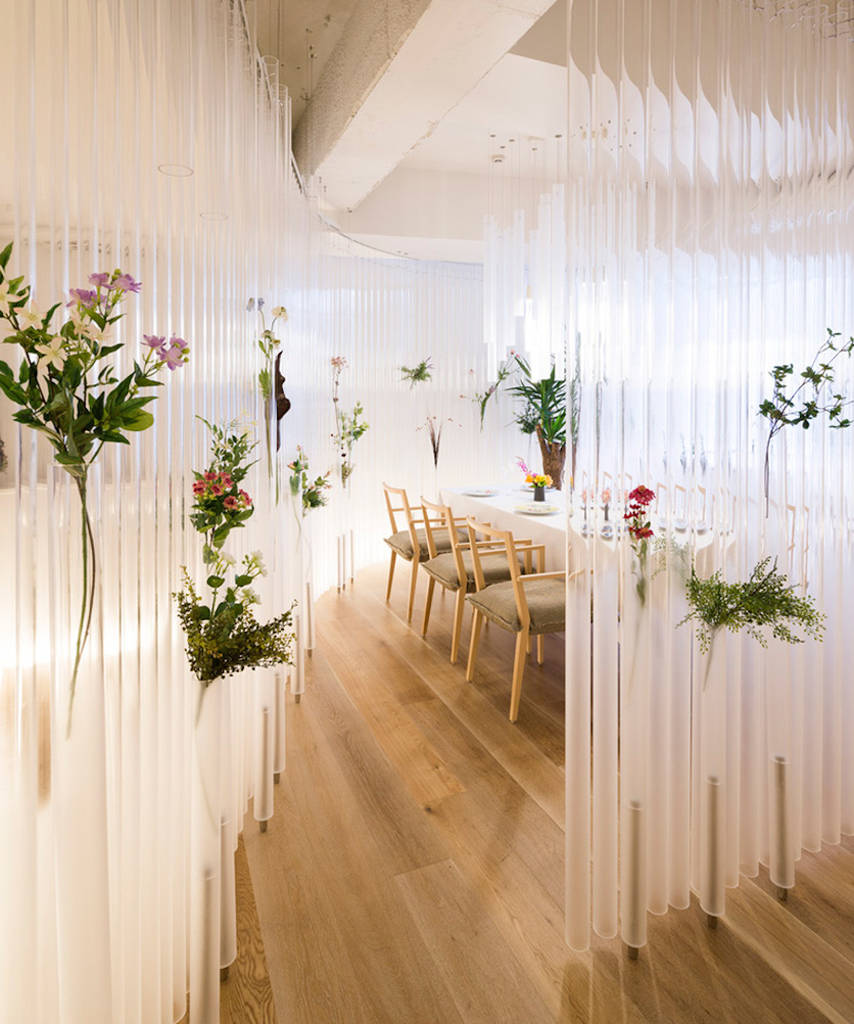 Amazing Restaurant Featuring Walls of Flowers & Transparent Tubes ...